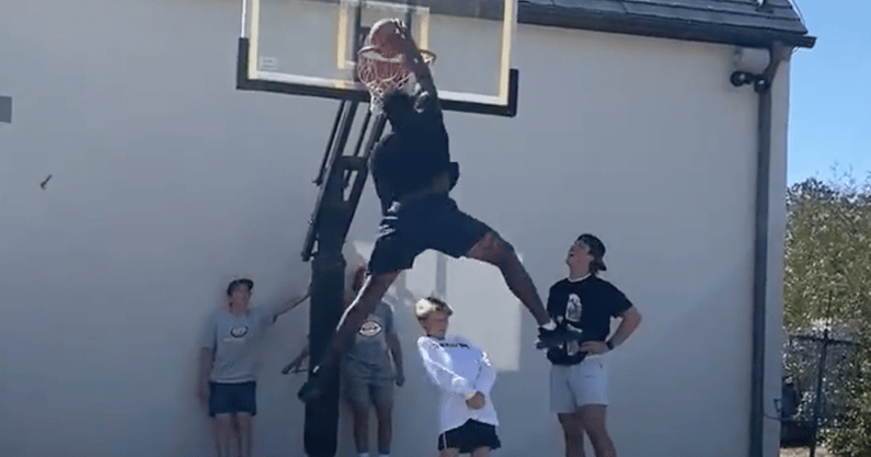 LOOK: Ole Miss tight end Michael Trigg dunks over Lane Kiffin's son - On3