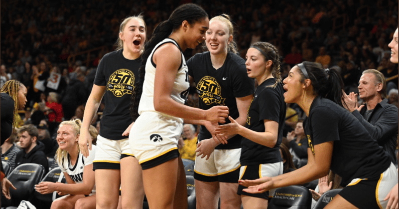 Caitlin Clark and Hannah Stuelke lead Iowa past Northwestern