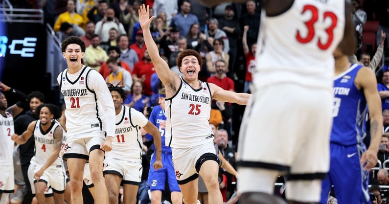 WATCH: San Diego State coach Brian Dutcher cuts down nets, celebrates ...