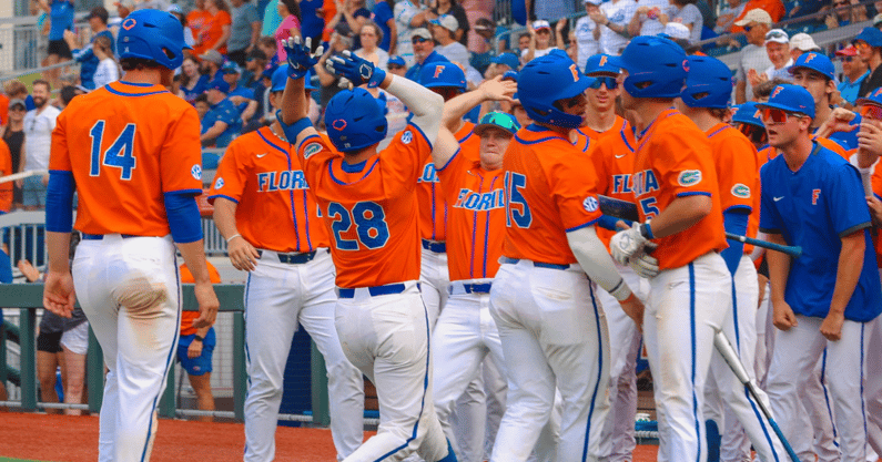 Heyman, Gators score 17 to steal series from Auburn