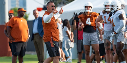 Delmond Landry is both the brother and position coach of Texas ...