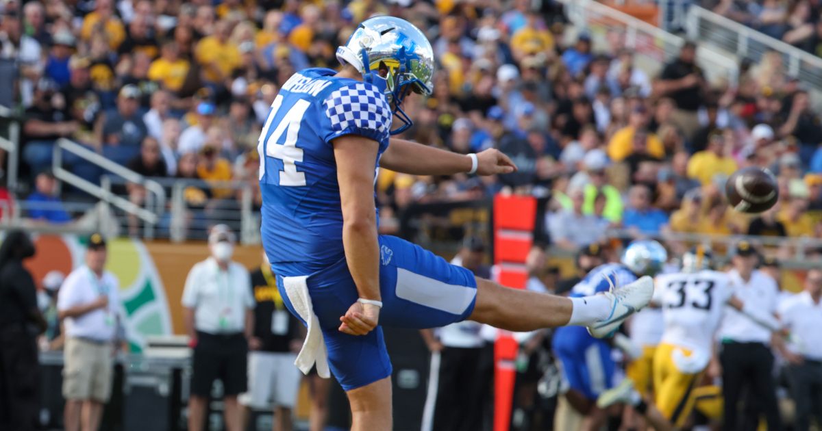 WATCH: Kentucky punter recovers bad snap, gets kick off before being ...
