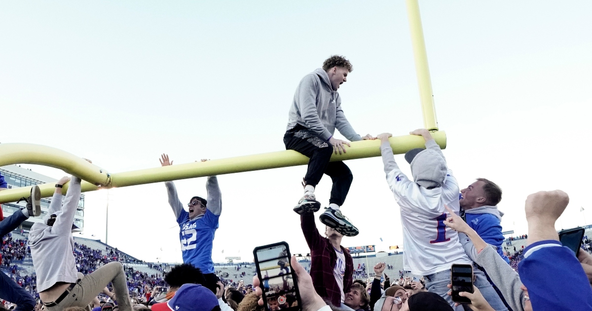 WATCH: Kansas fans toss goal post in lake to celebrate becoming bowl ...