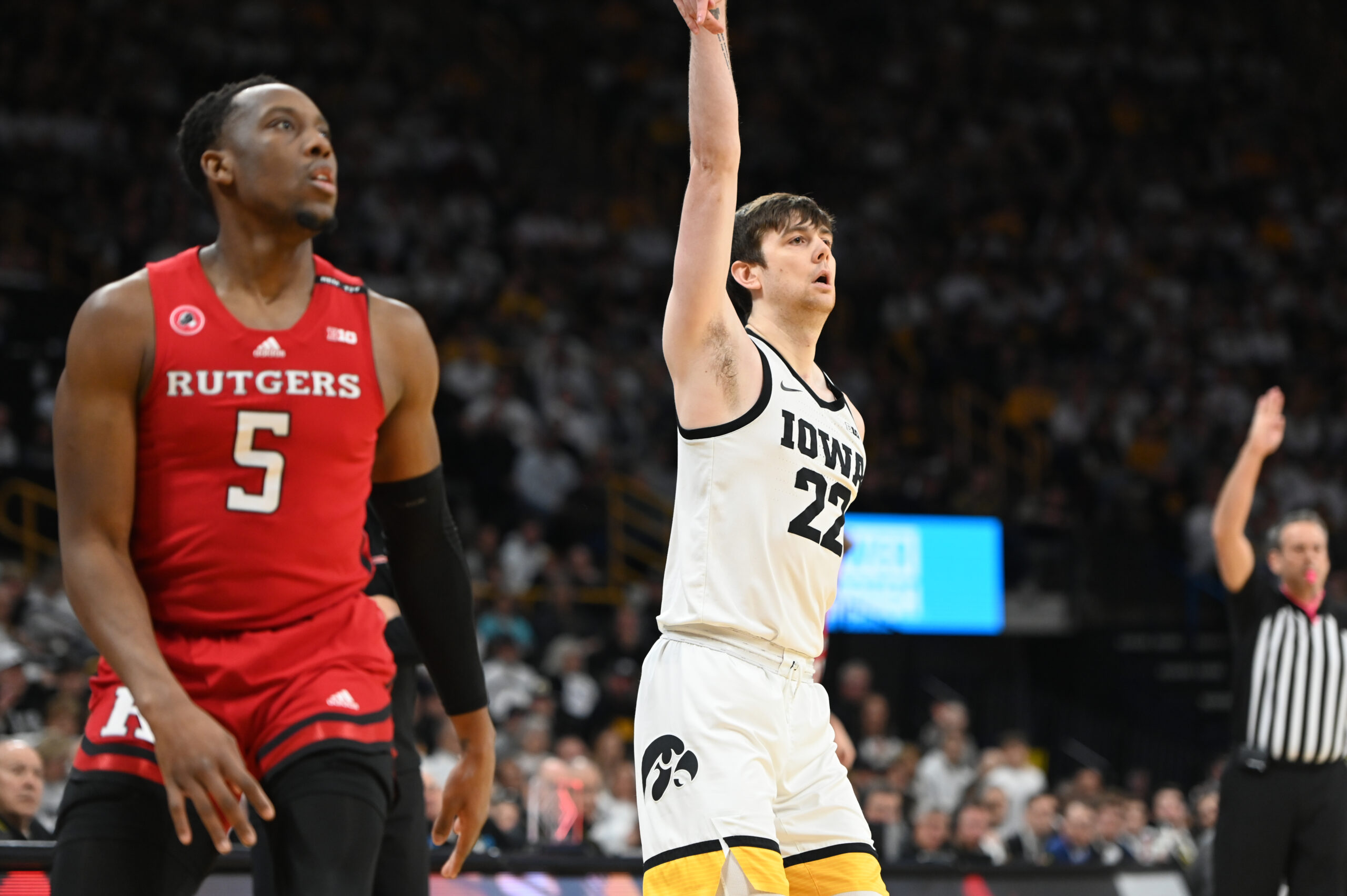 Iowa's Patrick McCafffery returns to the court