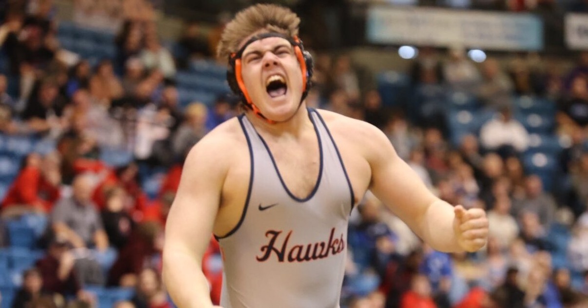 In-state lineman Brett Carroll reacts to Kansas State offer