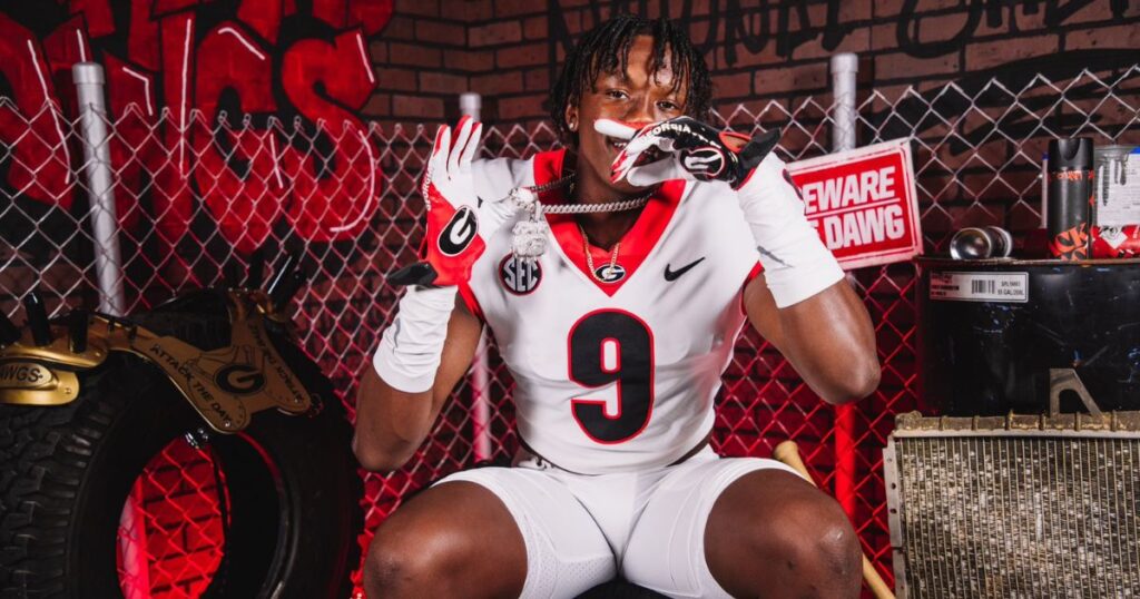 Georgia official visitors show off for uniform photo shoot