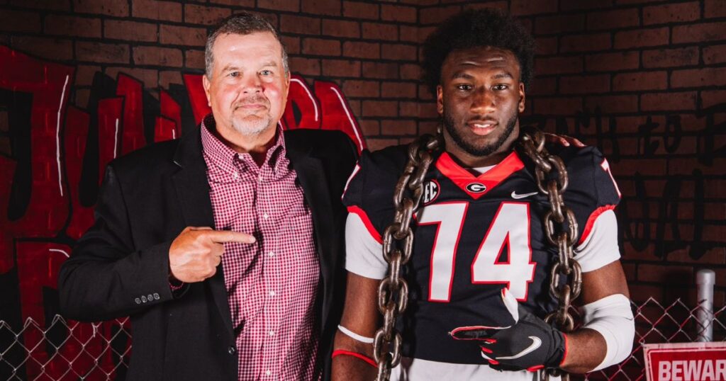 Georgia official visitors show off for uniform photo shoot