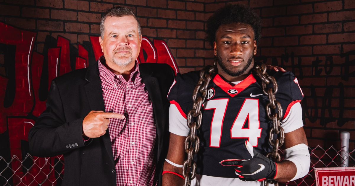 Georgia official visitors show off for uniform photo shoot