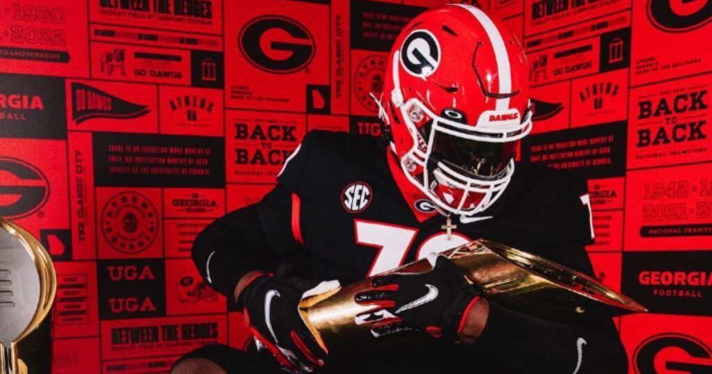 Georgia official visitors show off for uniform photo shoot