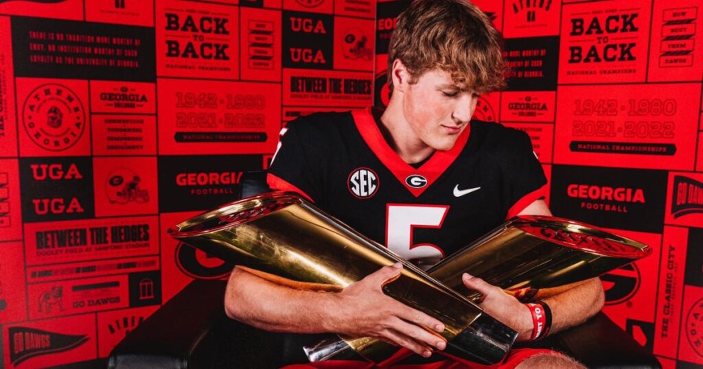 Georgia official visitors show off for uniform photo shoot