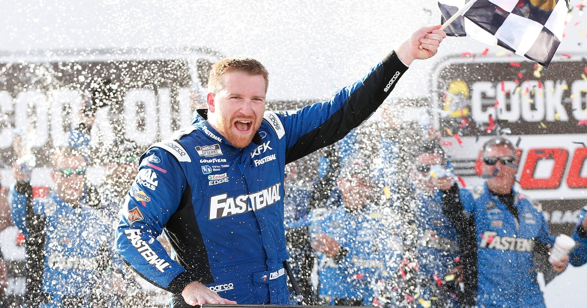 Chris Buescher posts picture of FireKeepers 400 trophy strapped in by ...