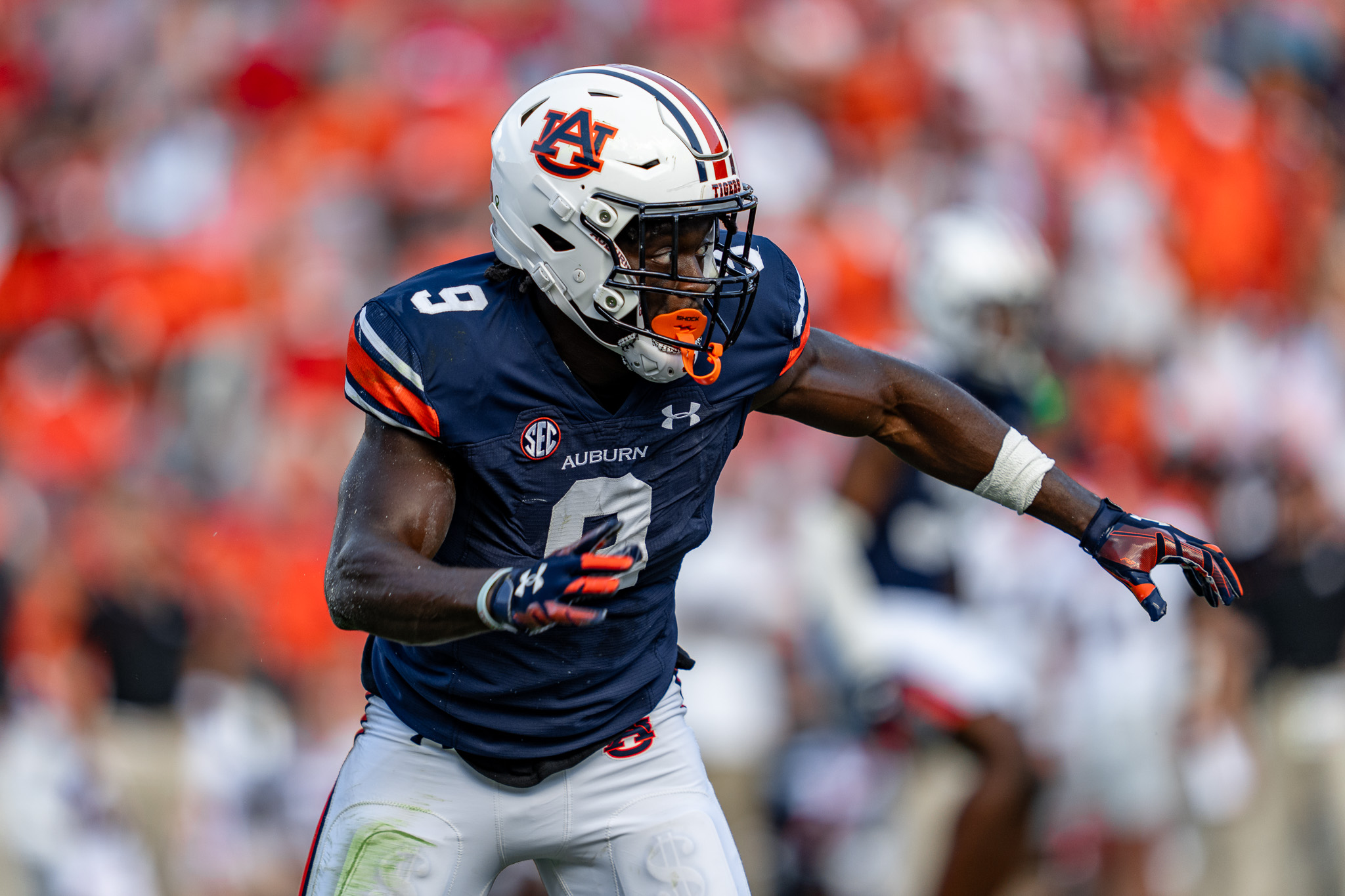 Auburn LB Eugene Asante will return for one more season