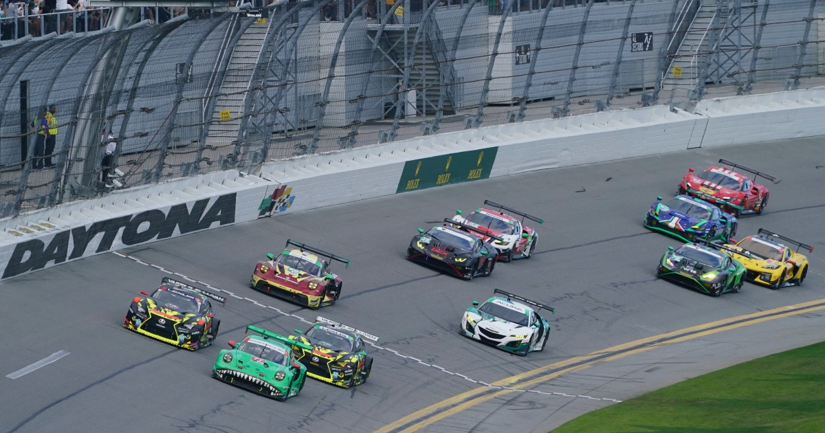 GTD Pro Porsche 'Rexy' racing with open door during Rolex 24 at Daytona