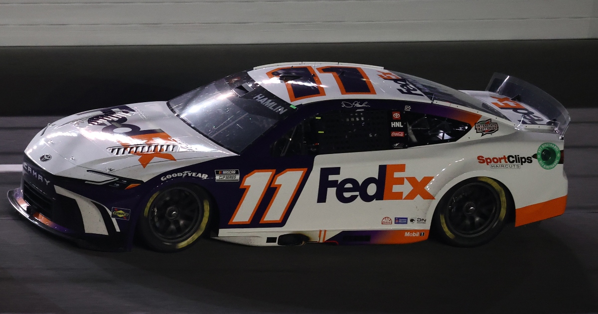 Denny Hamlin sent spinning after contact with Kyle Busch at Atlanta