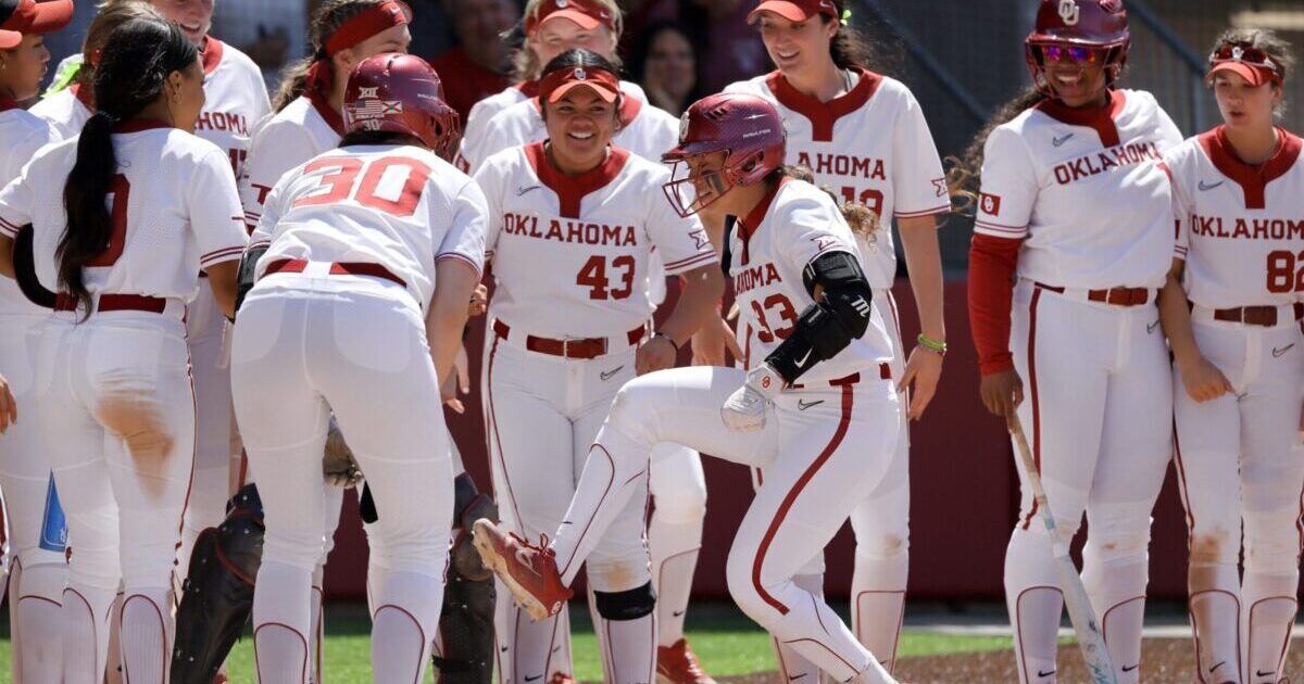 OU softball in that rare spot, trying to find 'it' again