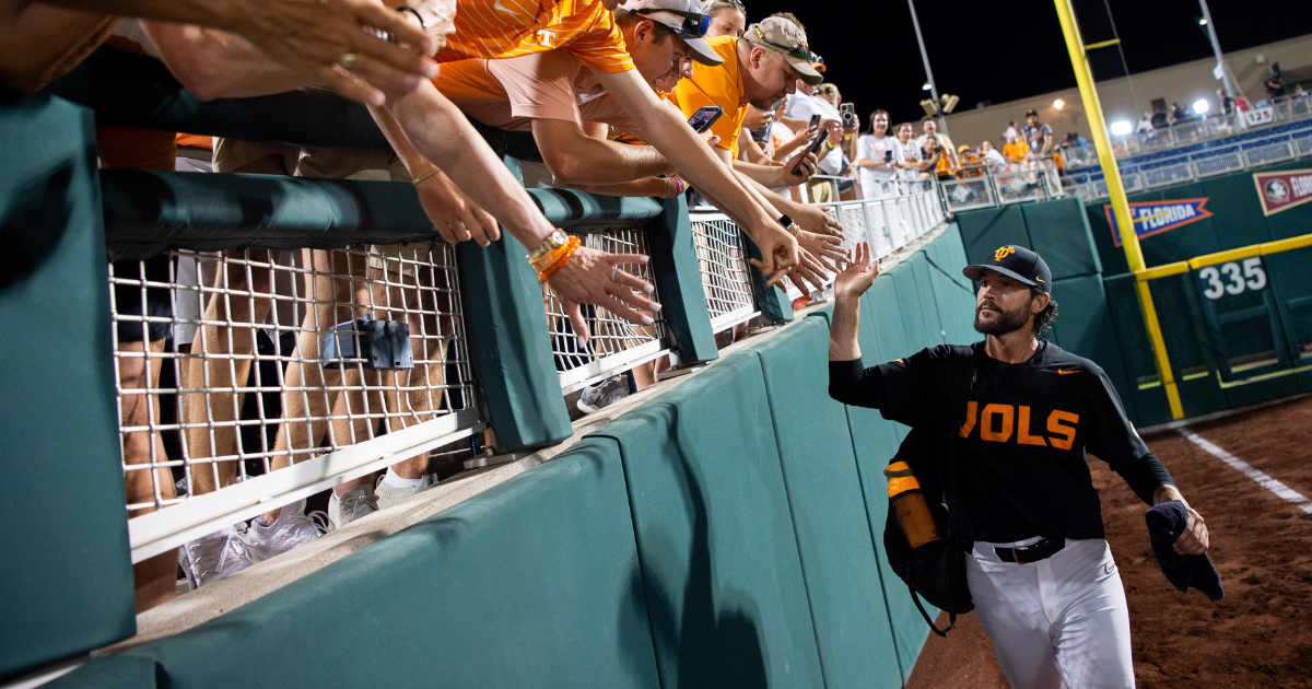 Tony Vitello embraces parents following College World Series win
