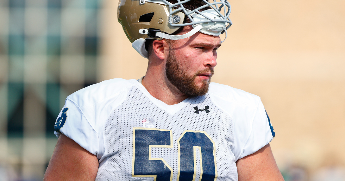 Spindler picks Nebraska in order "to develop and win," dad says