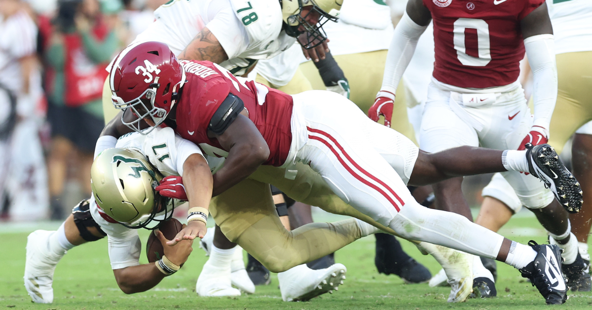 Que Robinson commended for playing two days after father's death