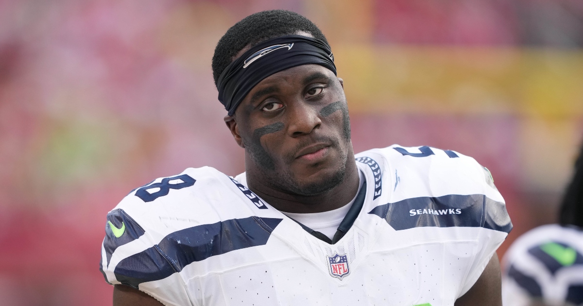 Detroit fans berate officials following Derick Hall one-armed sack - On3