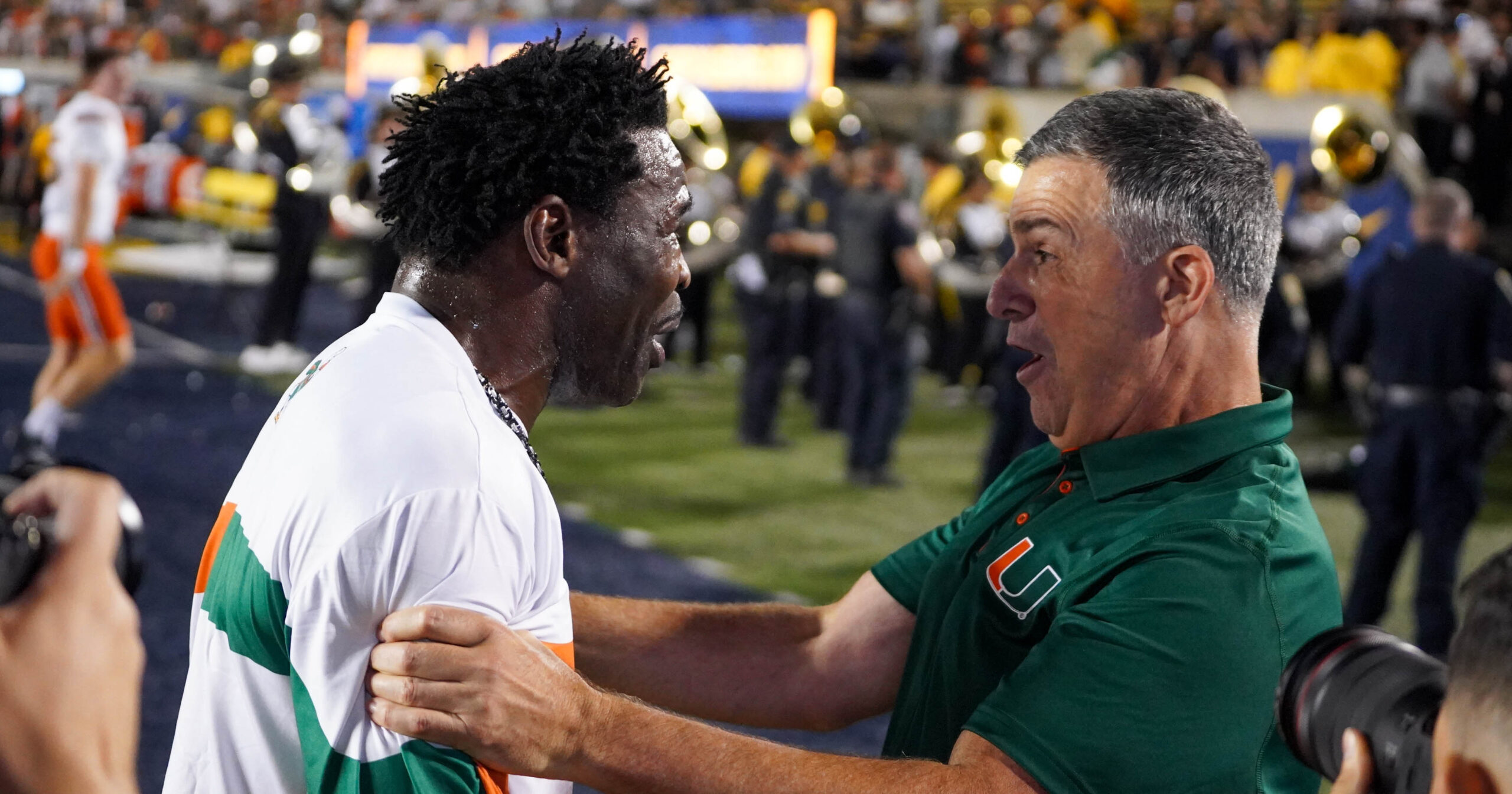 Miami Hurricanes' Mario Cristobal, players post Cal