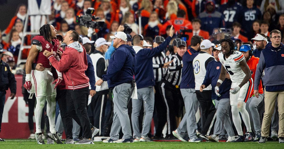 KeAndre Lambert-Smith, Zabien Brown throw football at each other during ...