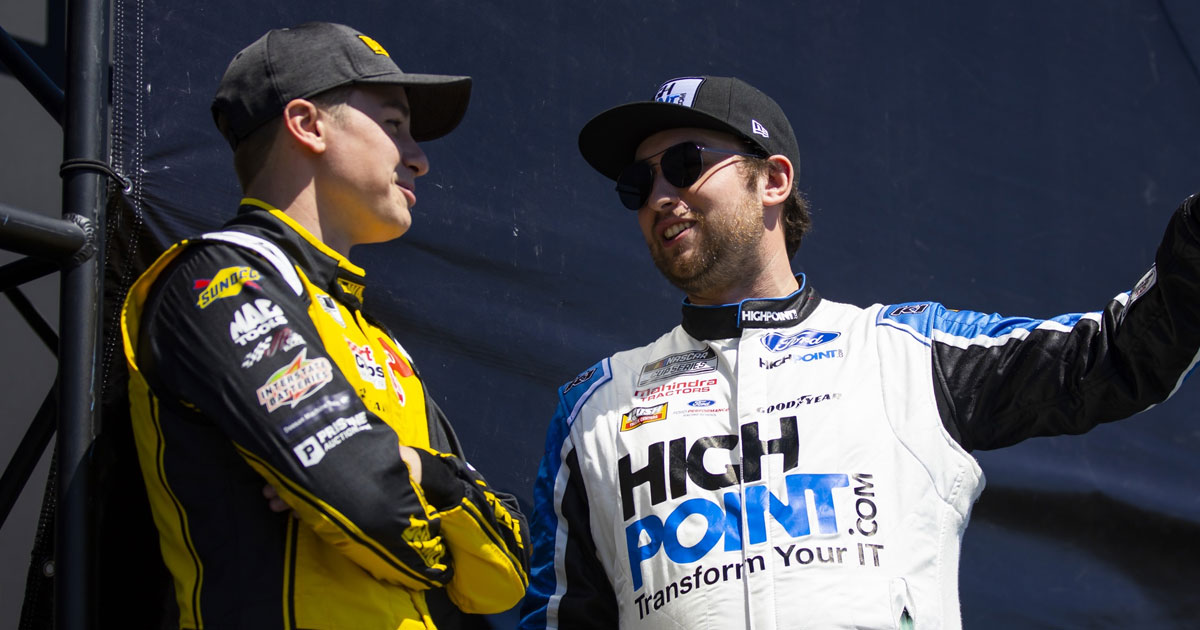 Chase Briscoe reacts to Christopher Bell using his pit stall at Las ...