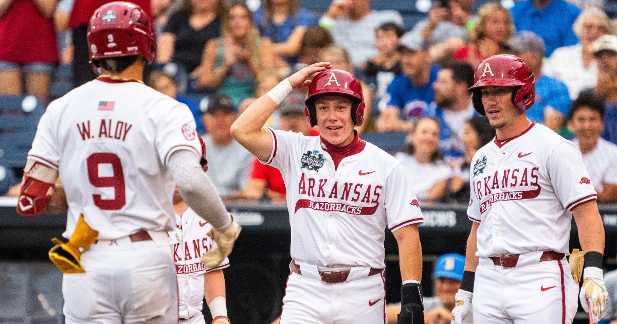 2025 College World Series: Arkansas bench runs to console Charles ...