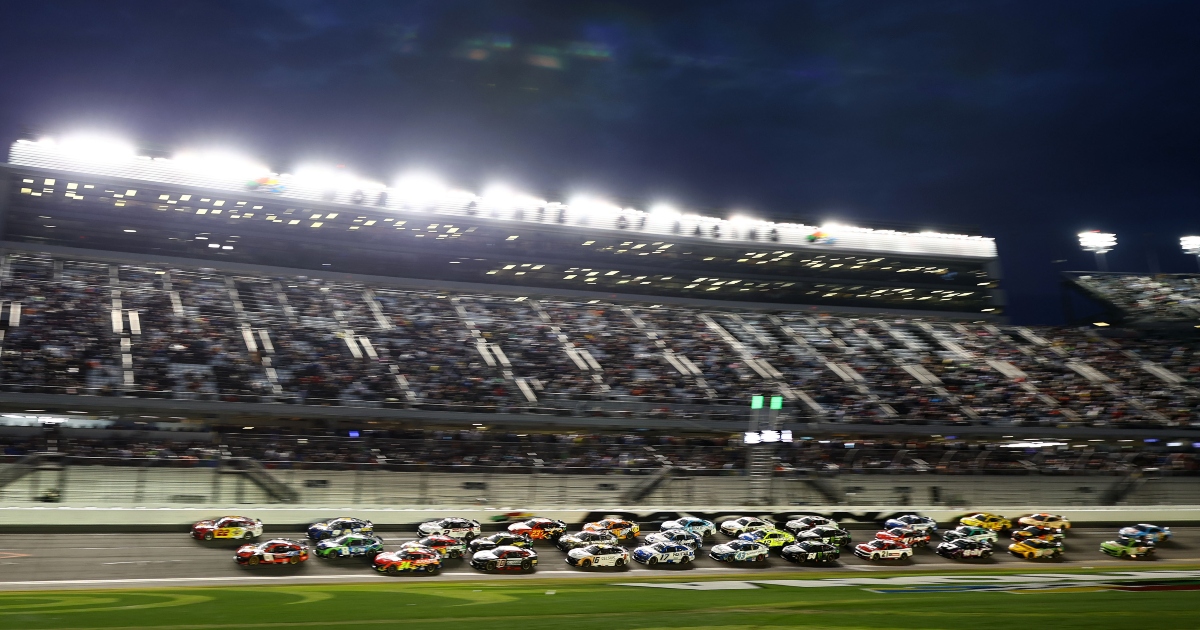 Coke Zero 400 green flag delivered by troops rappelling from helicopter ...