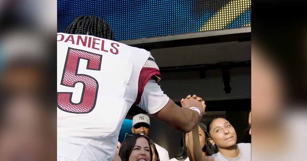JuJu Watkins celebrates with Jayden Daniels after Washington Commanders ...